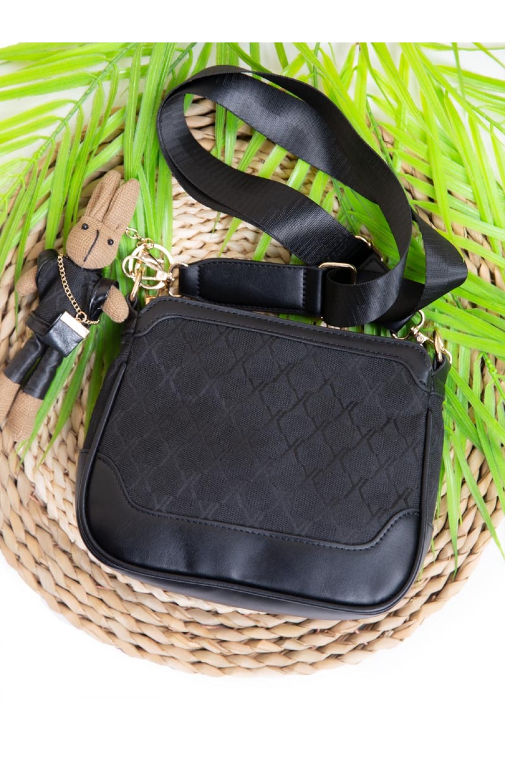 Bag decorated with a medal