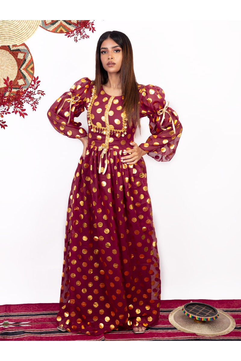 Galabia on the founding day, tied to the waist, with golden prints