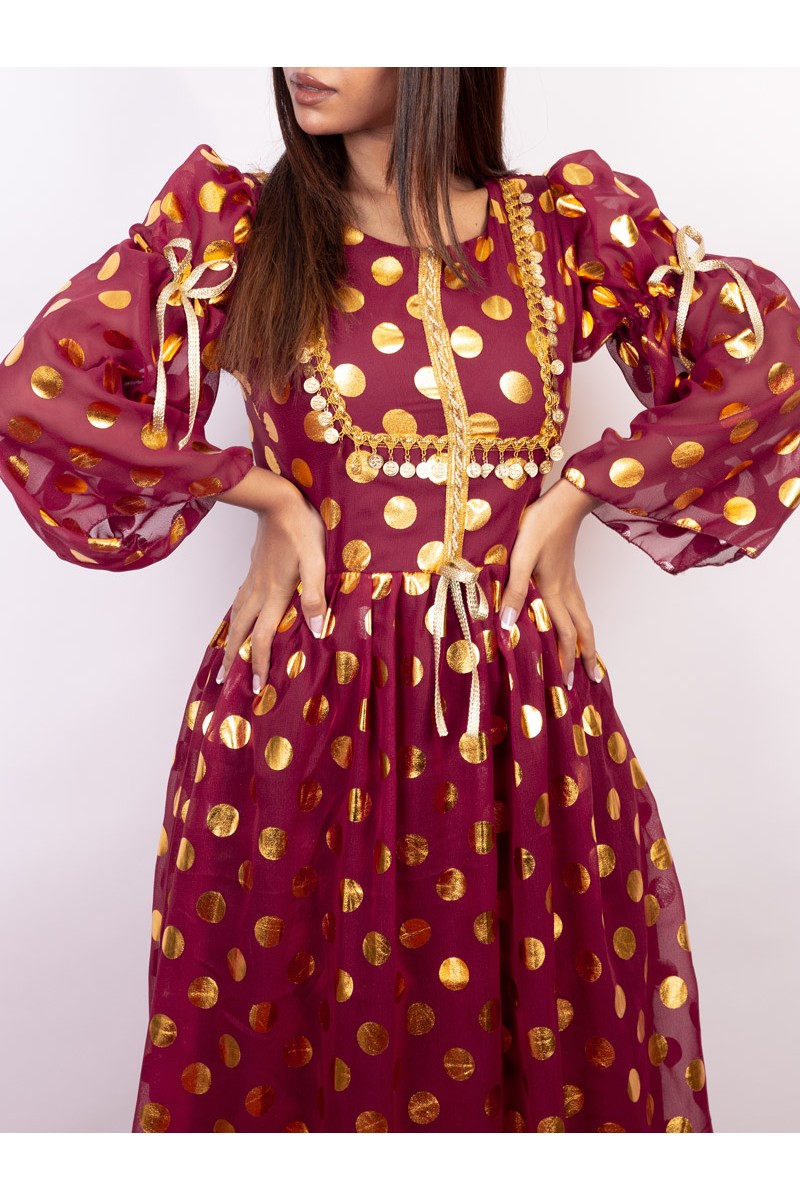 Galabia on the founding day, tied to the waist, with golden prints