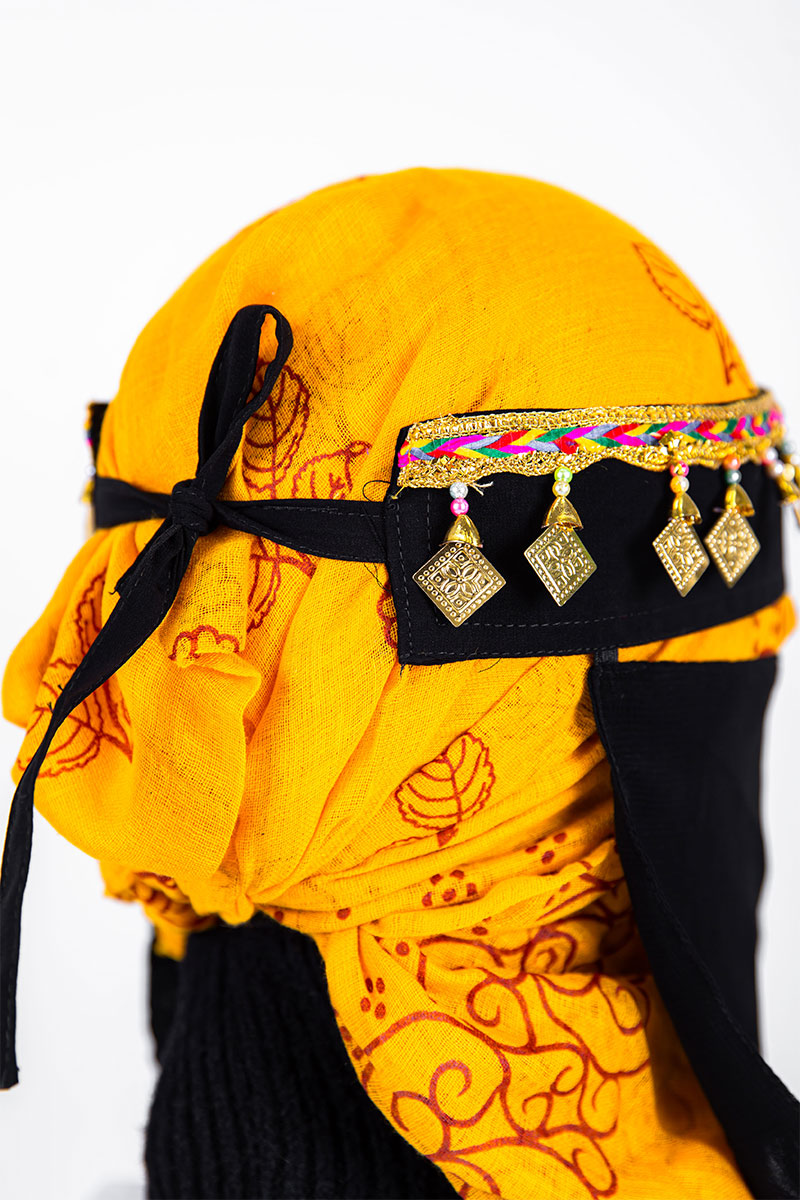 A black women's burqa for Foundation Day, decorated at the top with ...